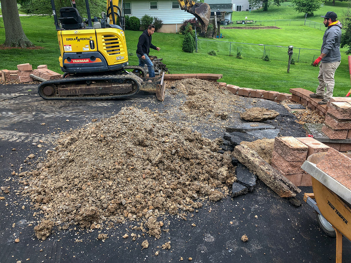 Residential Retaining Wall and Drain Repair - Greener Designs Landscaping